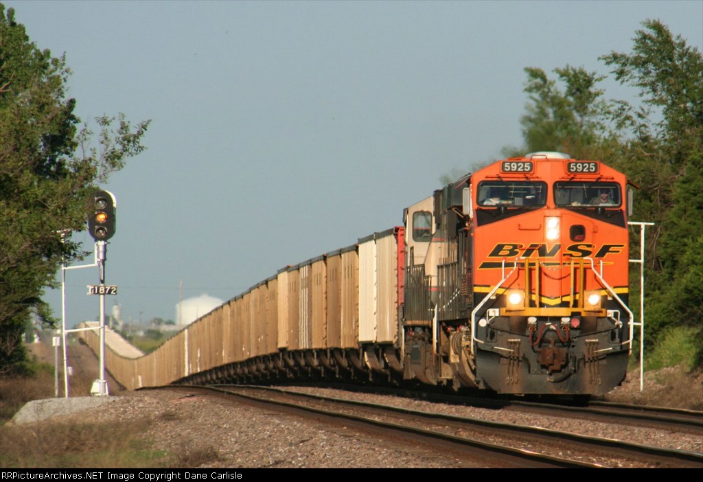BNSF 5925 leads is WB empty over the rolling hills